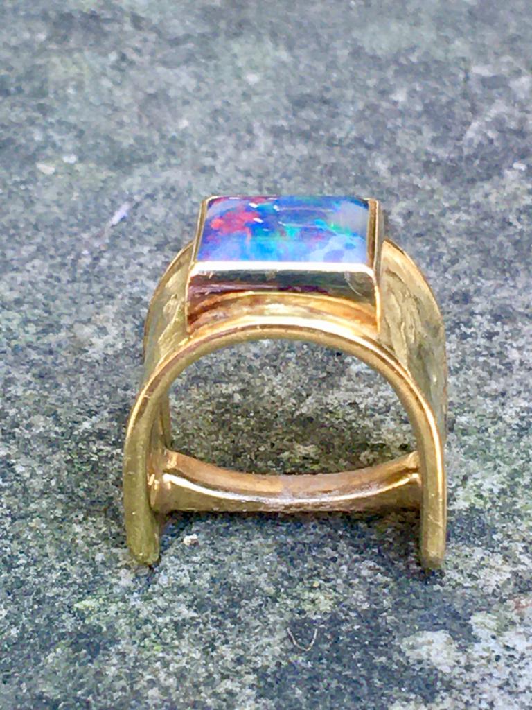 GERALD BENNEY 18CT GOLD AND OPAL RING,SIGNED,dated 1975